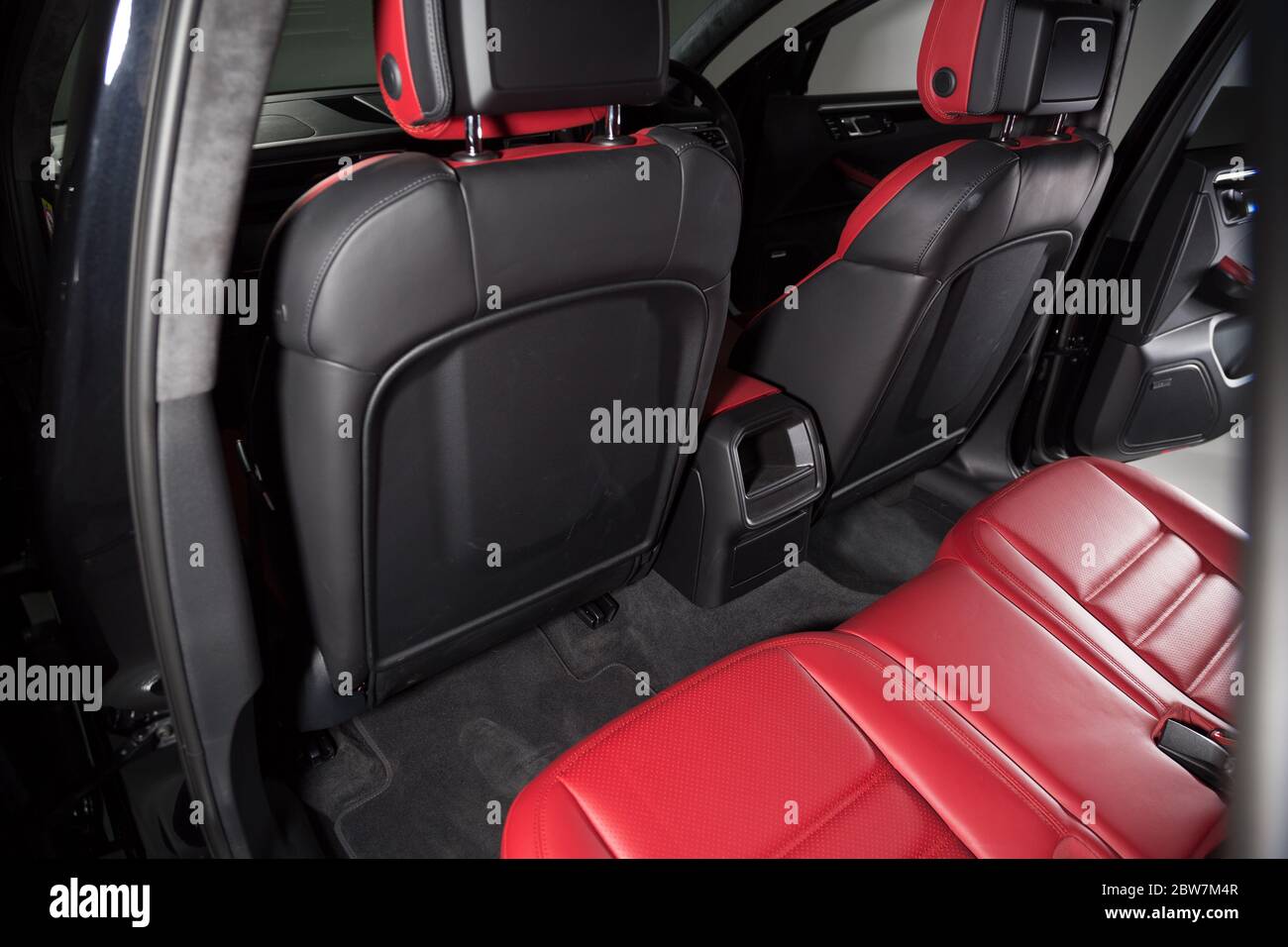 Shot of red leather seats of SUV car Stock Photo - Alamy