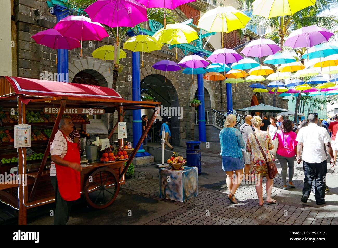 PORT LOUIS/ MAURITIUS - AUGUST 16, 2018: People walking across the main ...