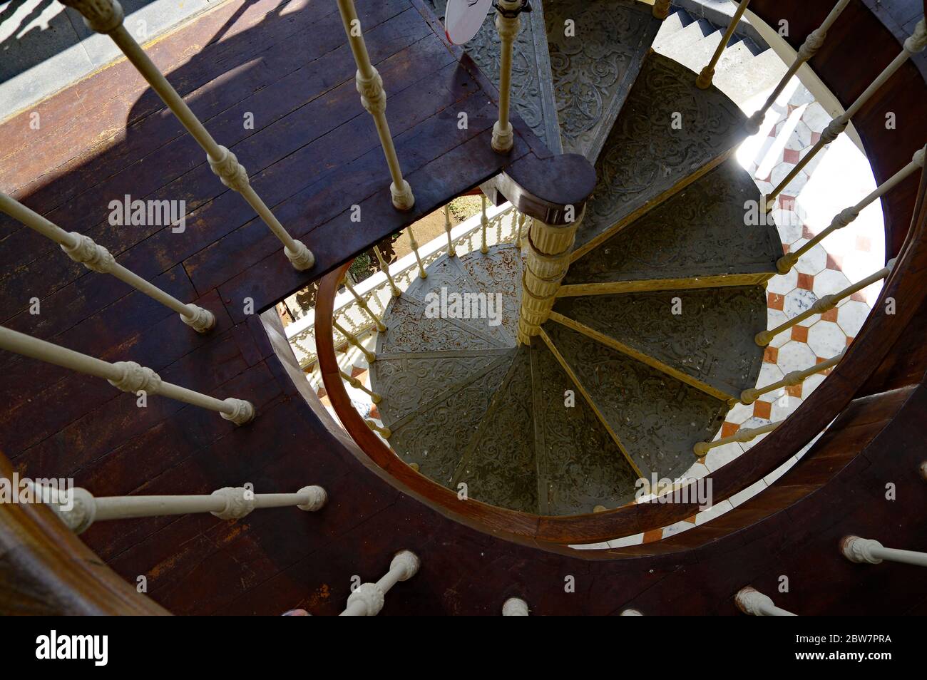 Old wooden spiral staircase connecting the floors of Chateau de ...