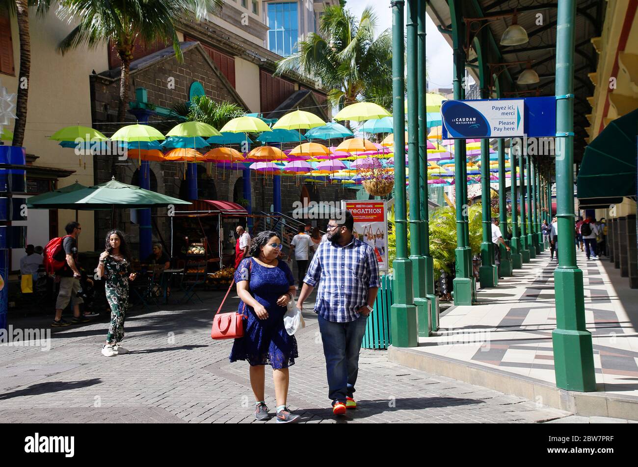 PORT LOUIS/ MAURITIUS - AUGUST 16, 2018: People walking across the main ...