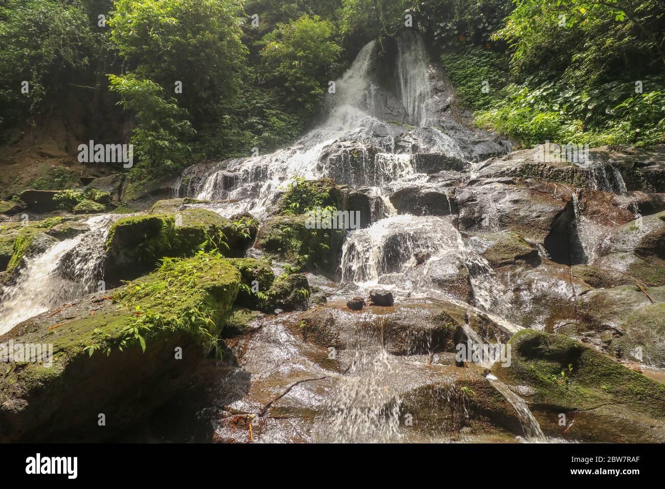Scenic cascade Goa Giri Campuhan waterfall in tropical jungle in Stock ...