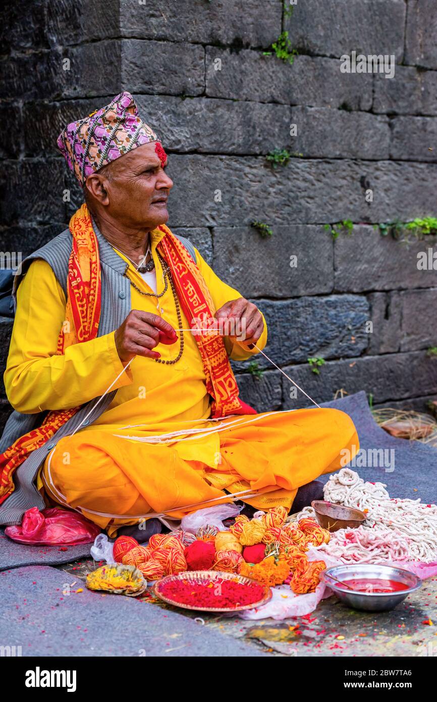 Kathmandu,Nepal - August 14,2019: Hindu priest Waiting people to tie ...