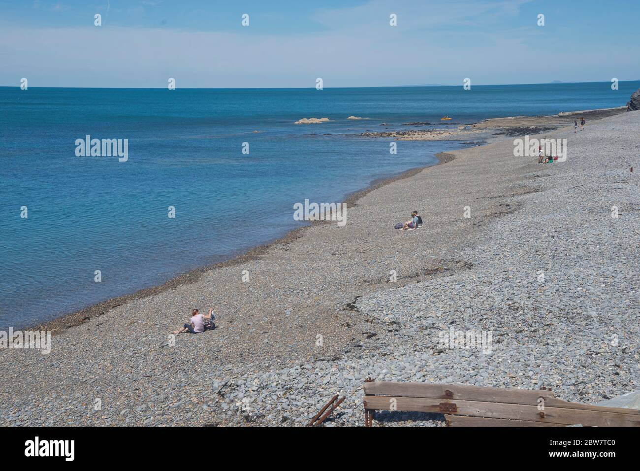 People enjoy the warm Spring sunshine after the Welsh government eased ...