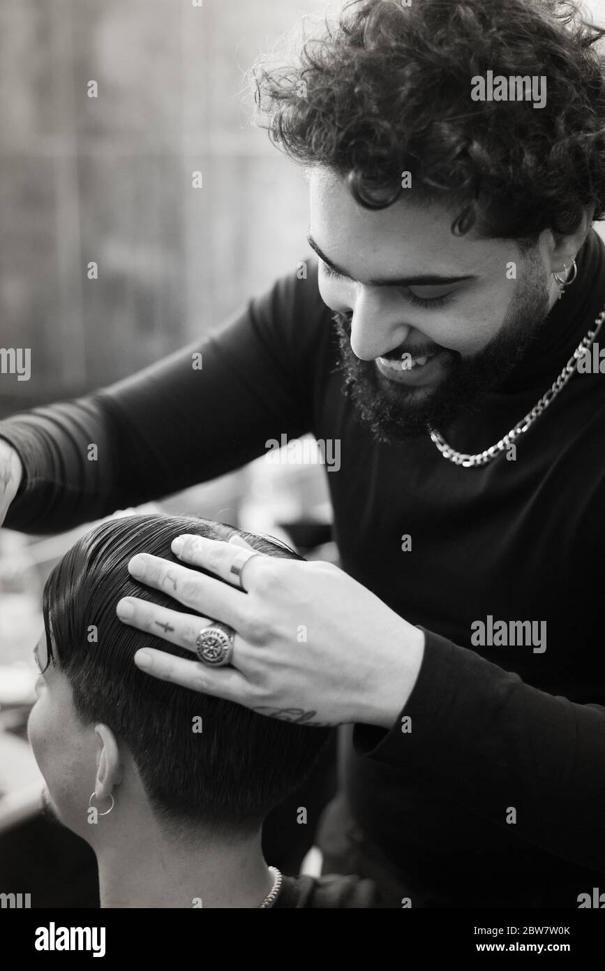 Portrait of a barber and his customer Stock Photo - Alamy