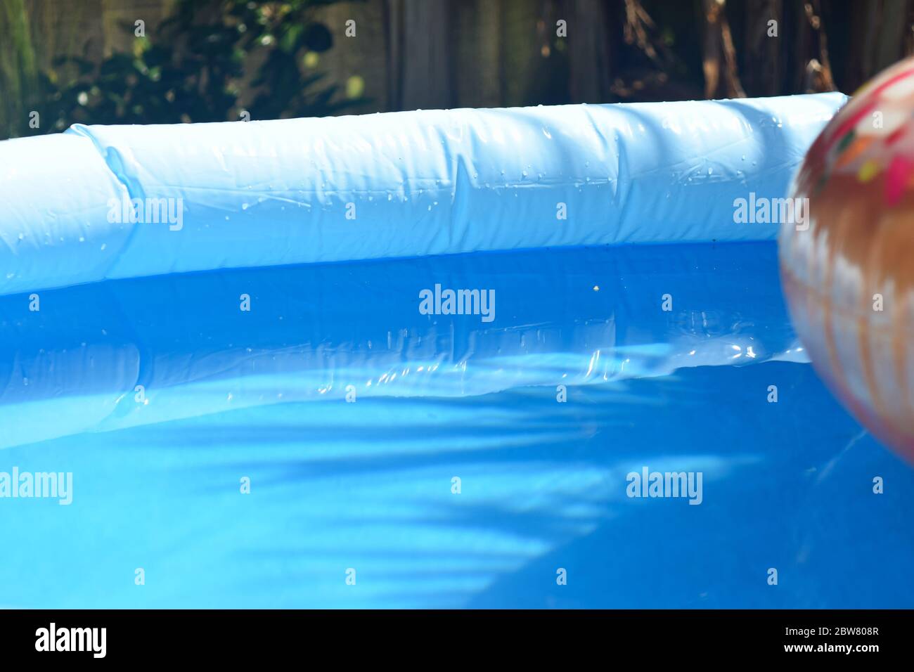 Donut float in Inflatable Pool in the garden Stock Photo - Alamy