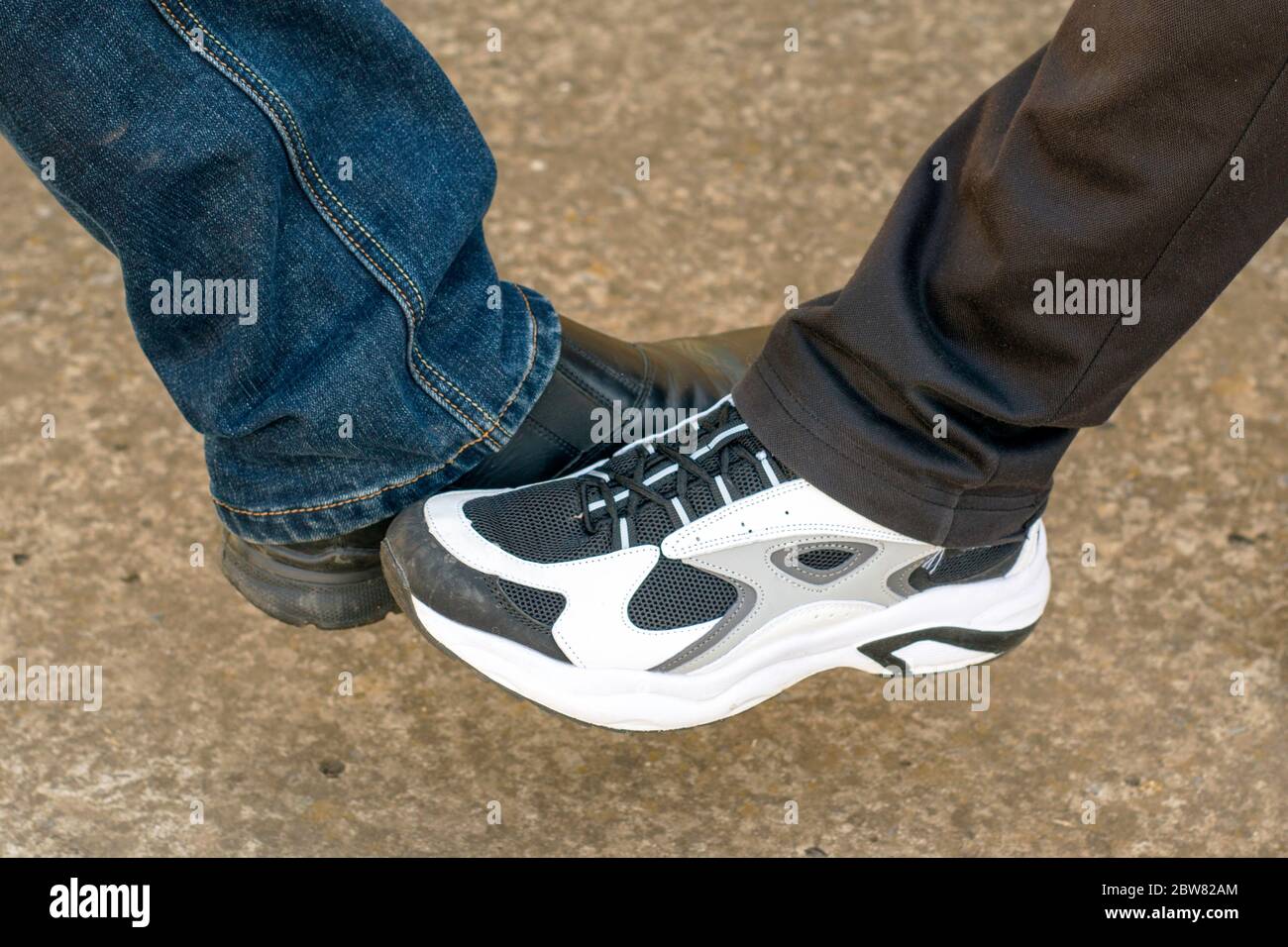 safe pandemic greeting concept two legs touching each other Stock Photo ...
