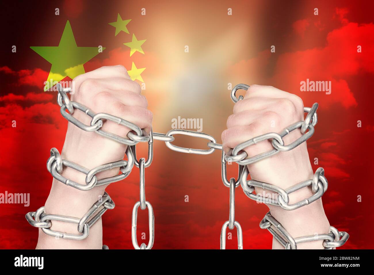 Two hands shackled a metal chain on China flag. Freedom concept Stock ...