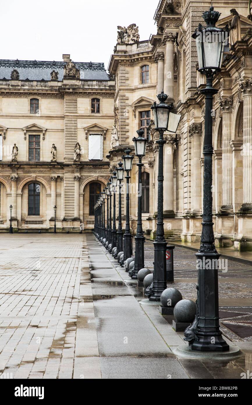 View of famous Louvre Museum with row of lights Stock Photo - Alamy