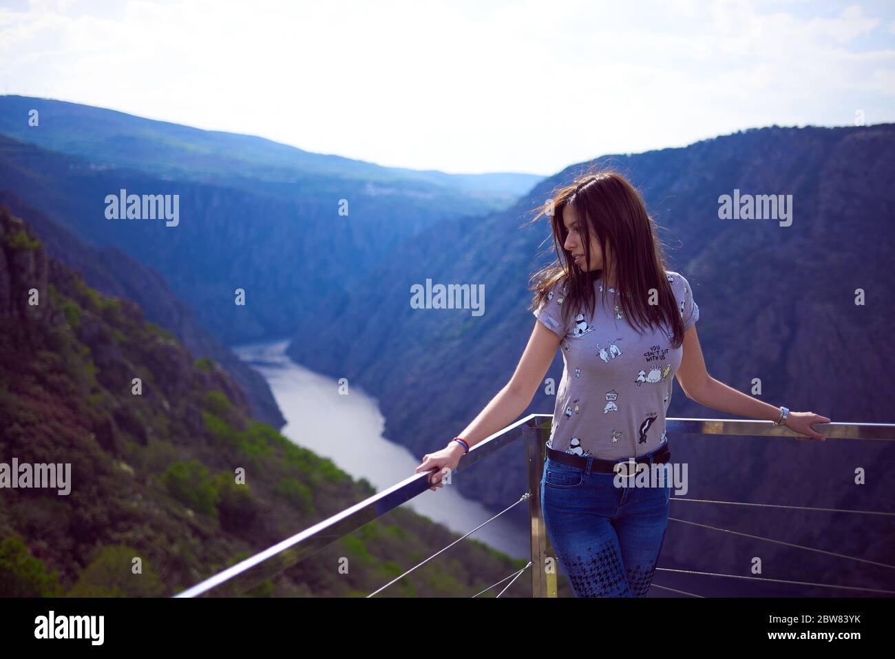 Young woman posing with the Sil canions on the background Stock Photo ...