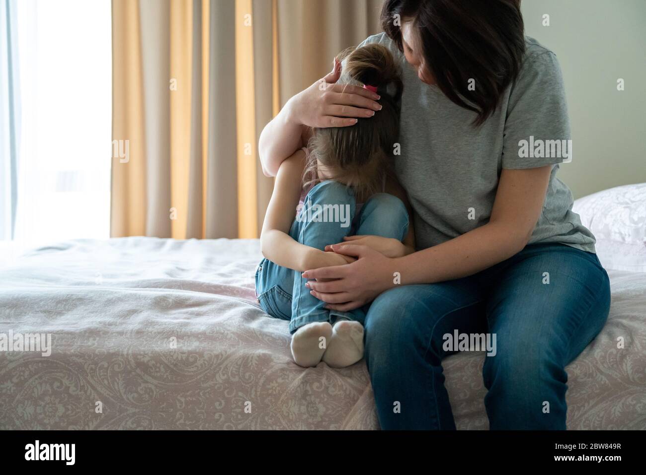 Comforting Upset Daughter High Resolution Stock Photography and Images - Alamy