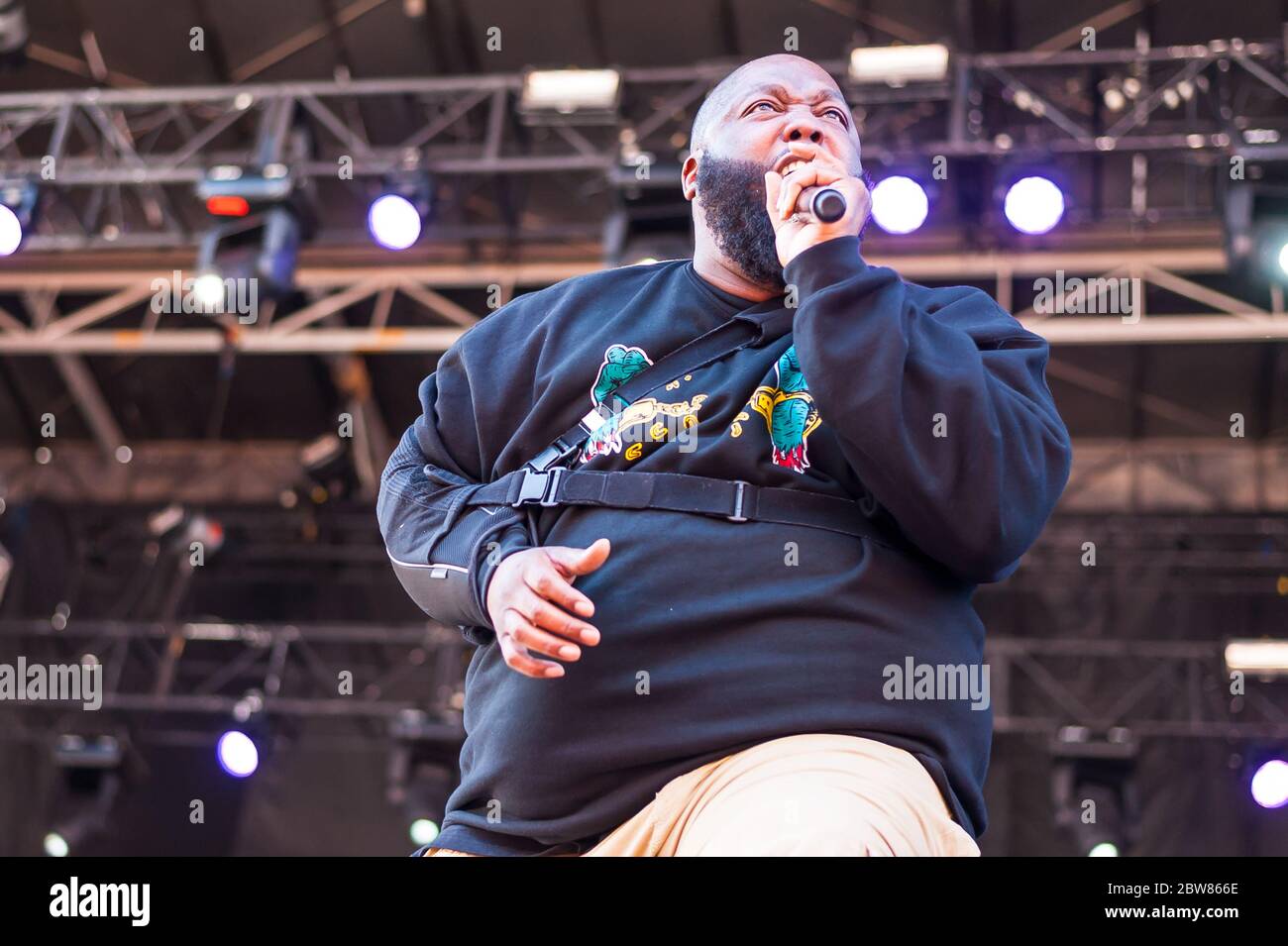 Closeup of Michael Santiago Render, aka "Killer Mike," screaming into a ...