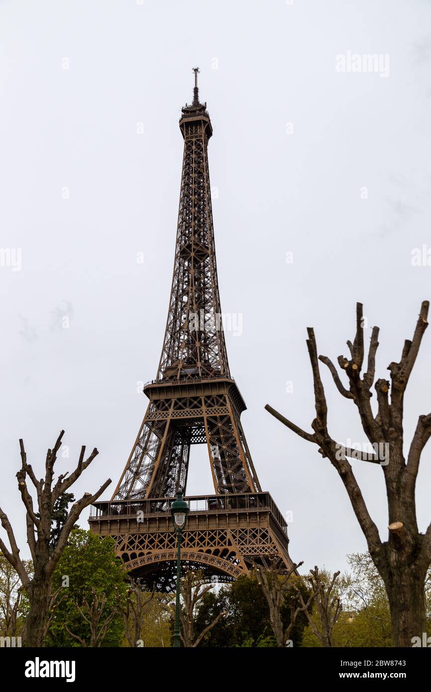 Eiffel tower with trees foreground hi-res stock photography and images ...
