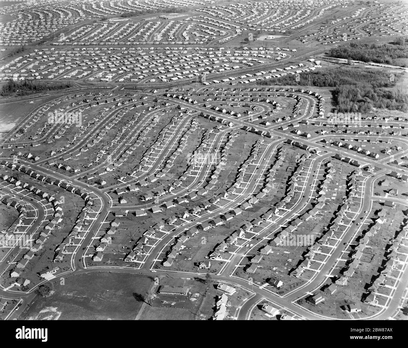 1960s AERIAL OF SUBURBAN HOUSING DEVELOPMENT - a5710 HEL001 HARS BLACK ...