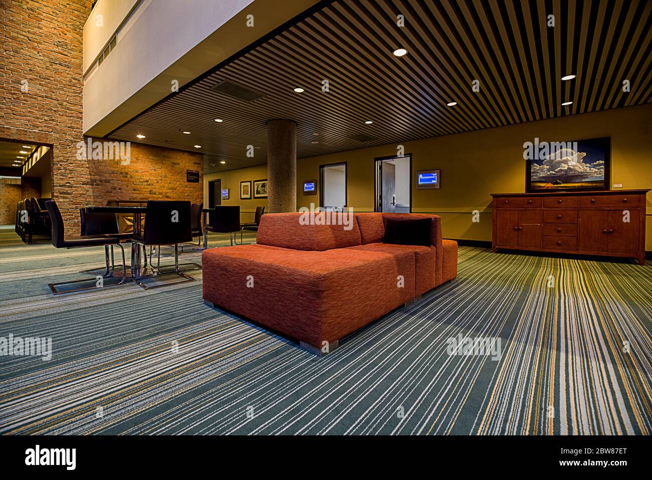 Interior Hotel Lobby and Conference Space with Warm Tone Decor and Cool ...