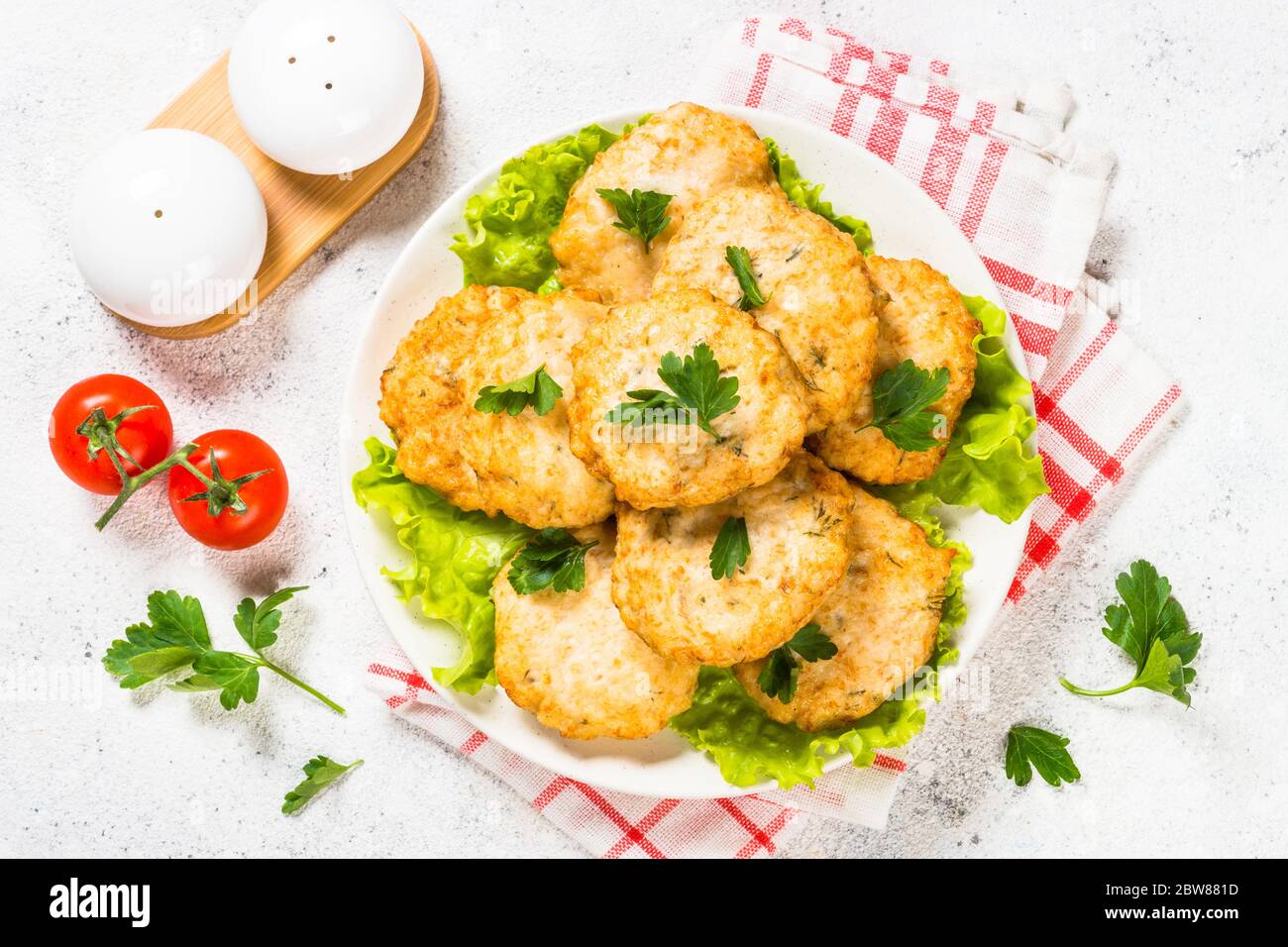 Chicken cutlet in the plate Stock Photo - Alamy