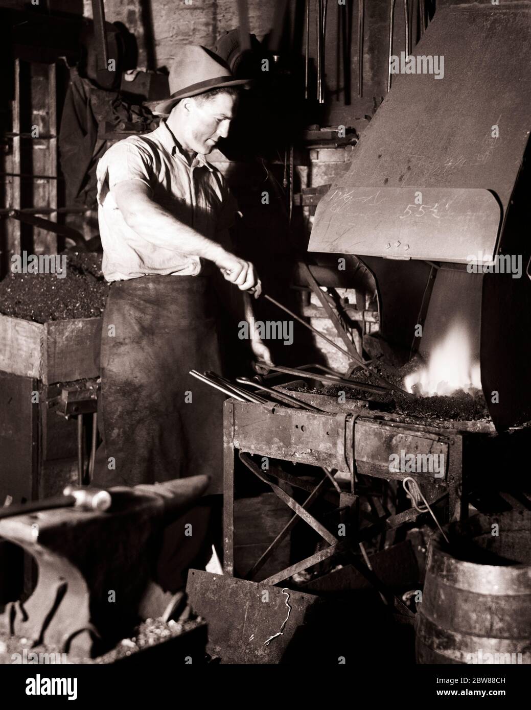 Employee worker workers working apron hi-res stock photography and ...