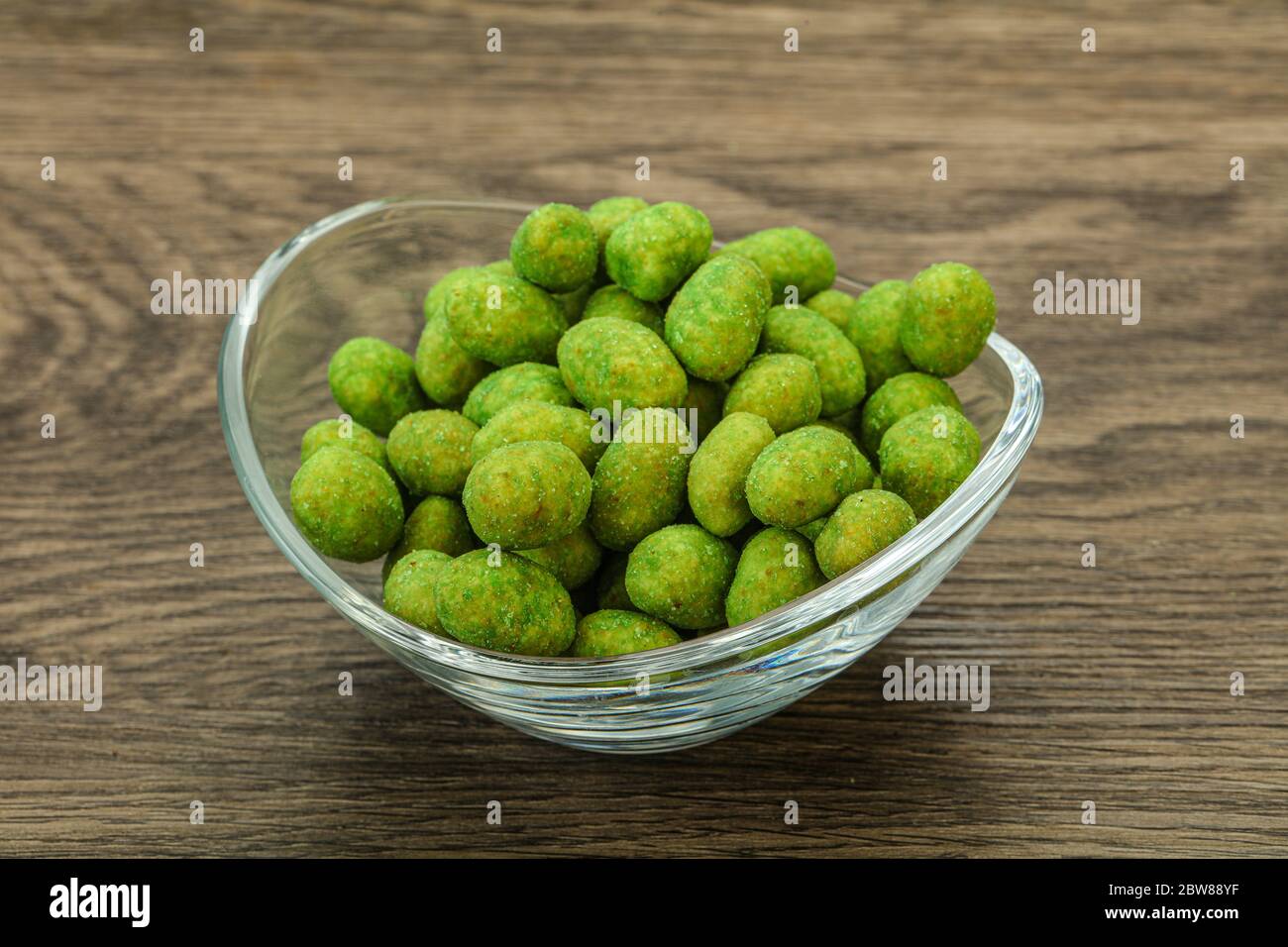 Spicy wasabi peanuts snack in the bowl Stock Photo - Alamy