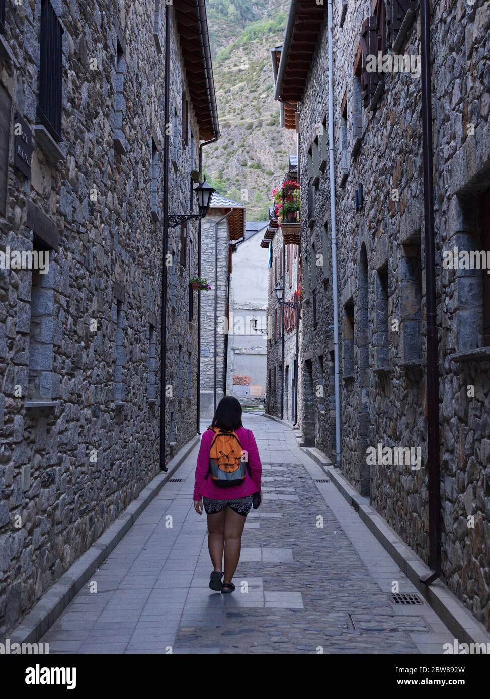 Benasque, Huesca/Spain; Aug. 20, 2017. A tourist walks through the old ...