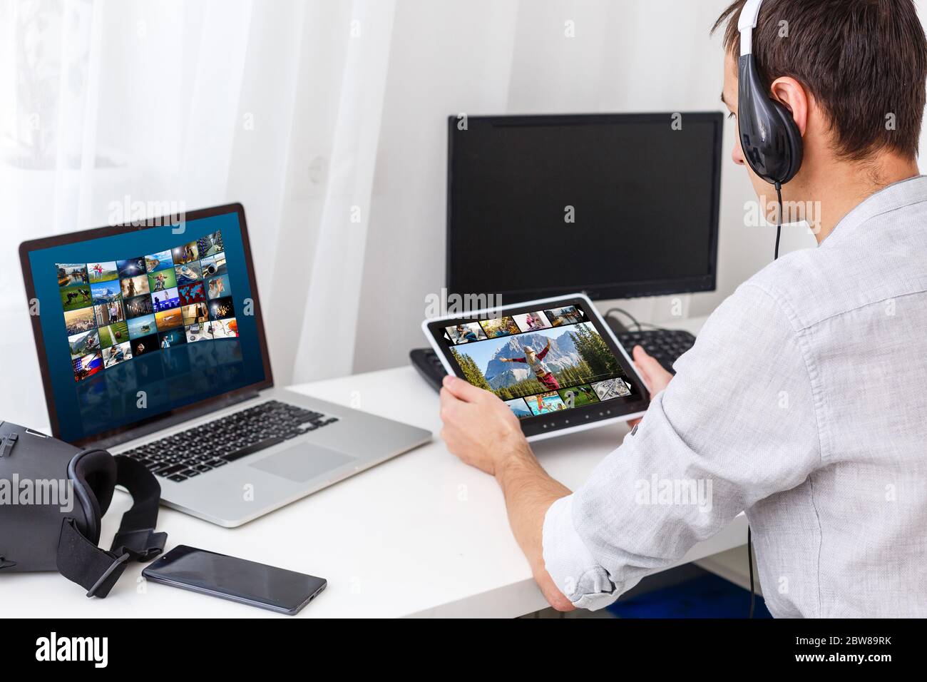 Man switching tv channels night hi-res stock photography and images - Alamy