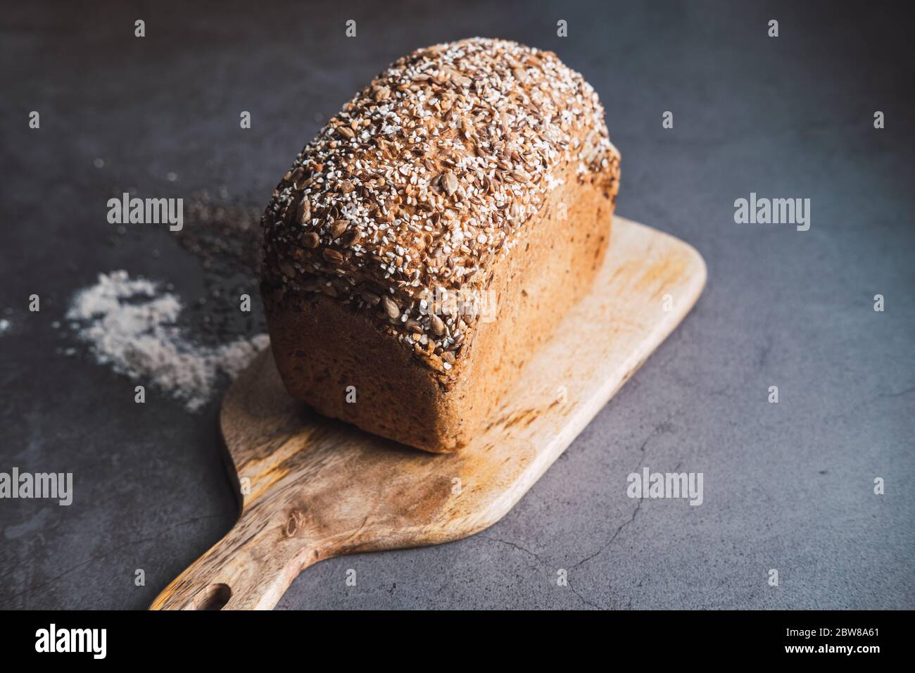 Rustic loaf of bread with seeds as chia and sunflower Stock Photo - Alamy