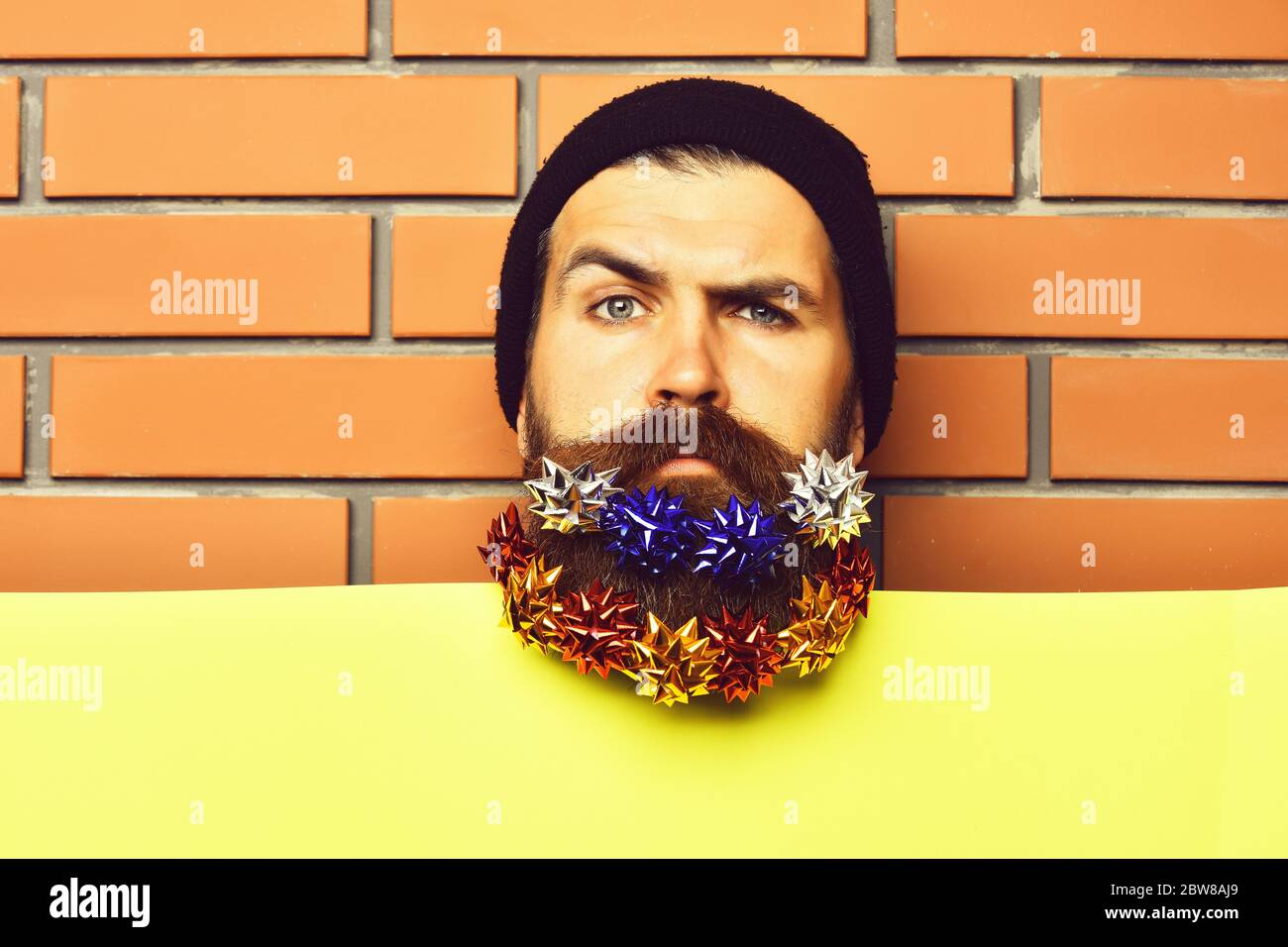 Bearded man, long beard. Brutal caucasian squinting hipster with ...