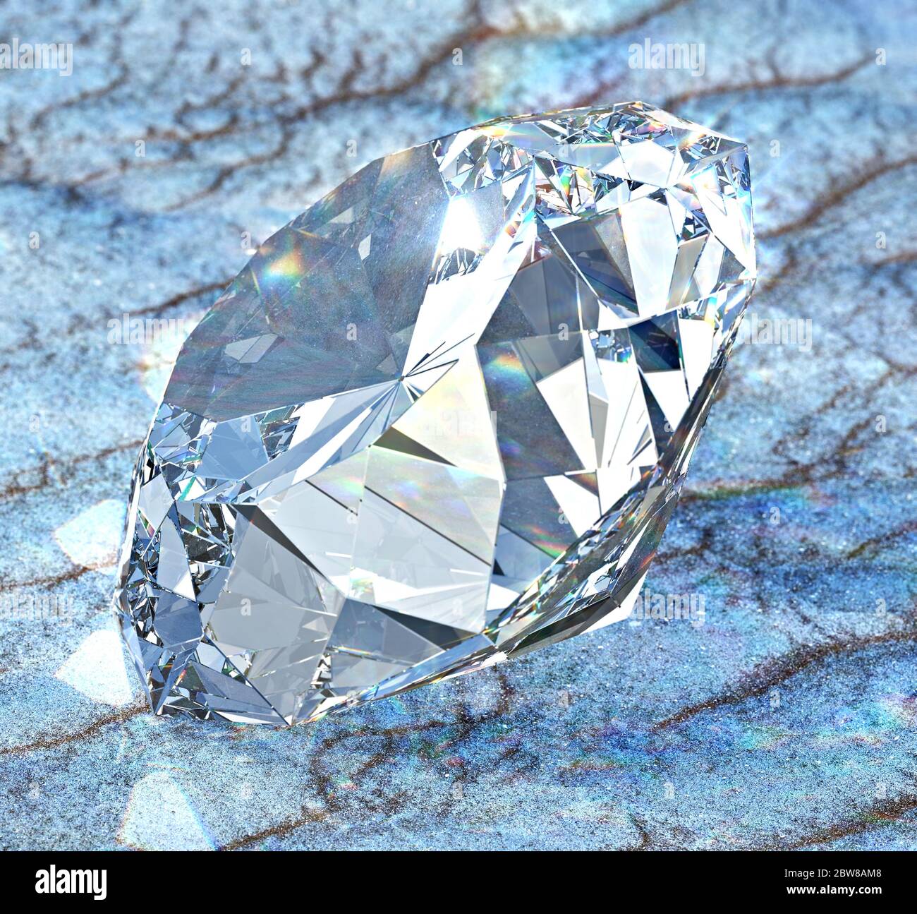 Diamond with caustic light on sand Stock Photo - Alamy