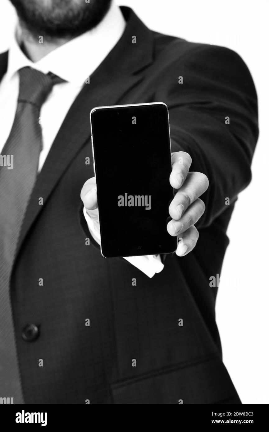 mobile phone in hand of man or businessman in formal outfit blue color ...
