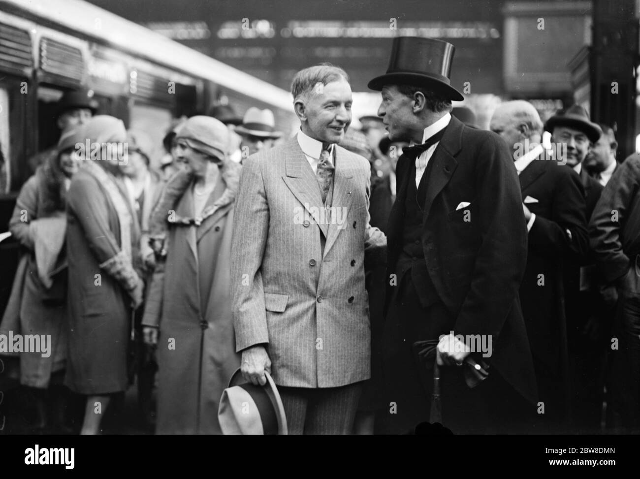 New U S Ambassador arrives in London . Sir Robert Vansittart deep in conversation with General ...