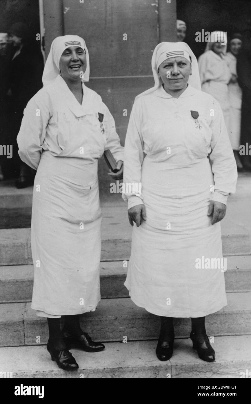 French nuses decorated with high honours in Paris . Mme Sarrazain and ...