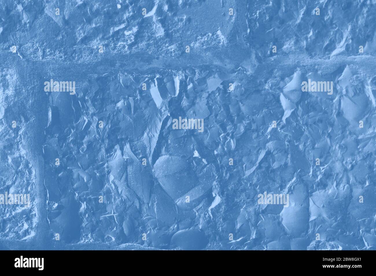 Classic blue wall with sandstone texture. Stone surface texture ...