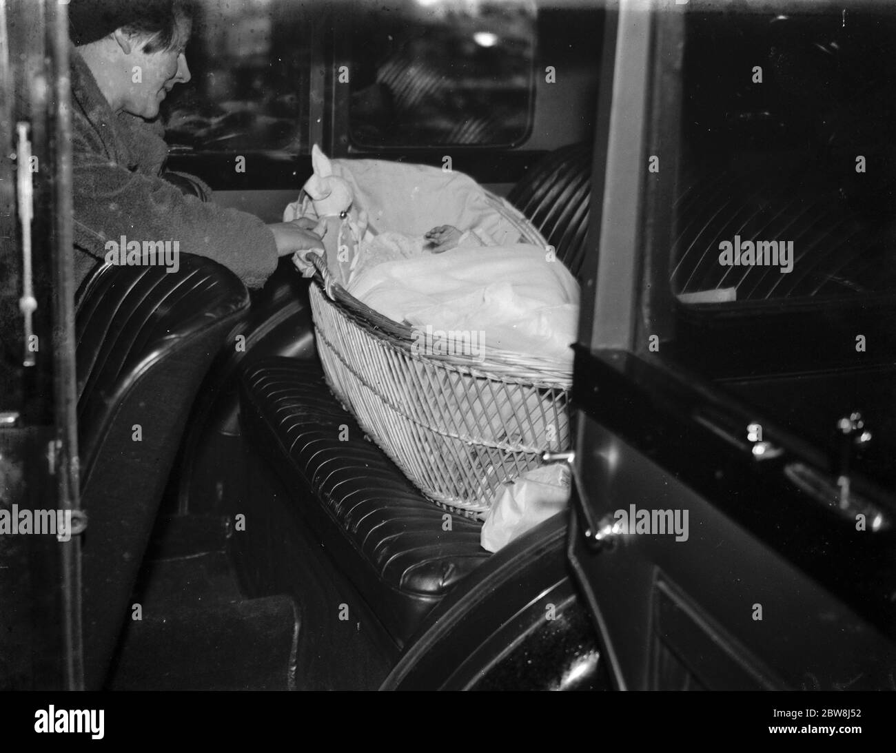 Baby in car , basket . 1935 Stock Photo - Alamy