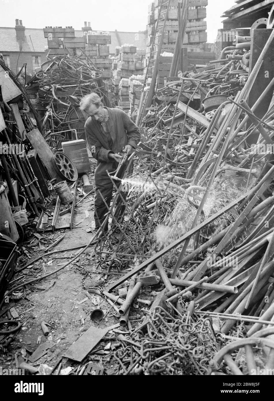 Scrap metal scrap iron Black and White Stock Photos & Images - Alamy