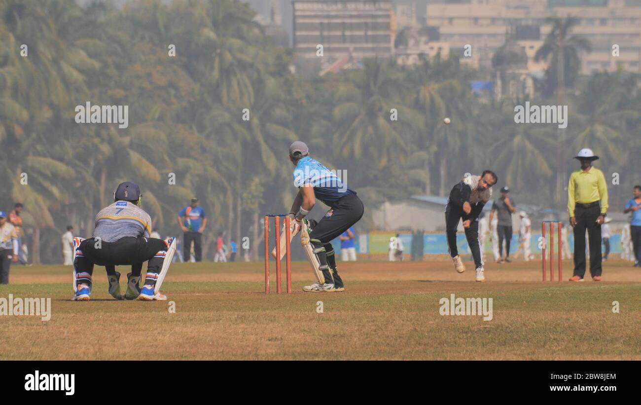 Mumbai, India - 5 december 2018: People playing cricket in the central ...