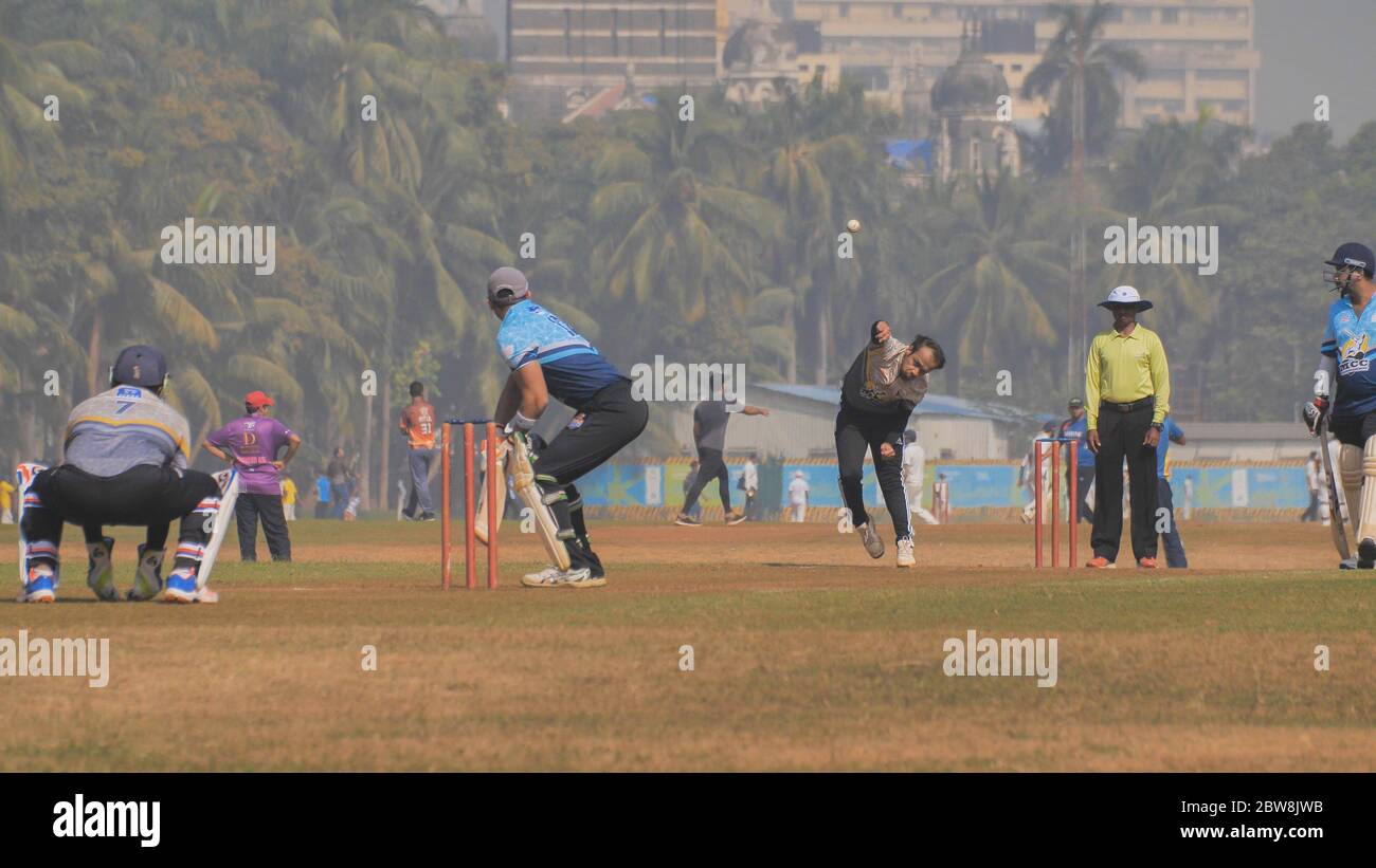 Mumbai, India - 5 december 2018: People playing cricket in the central ...