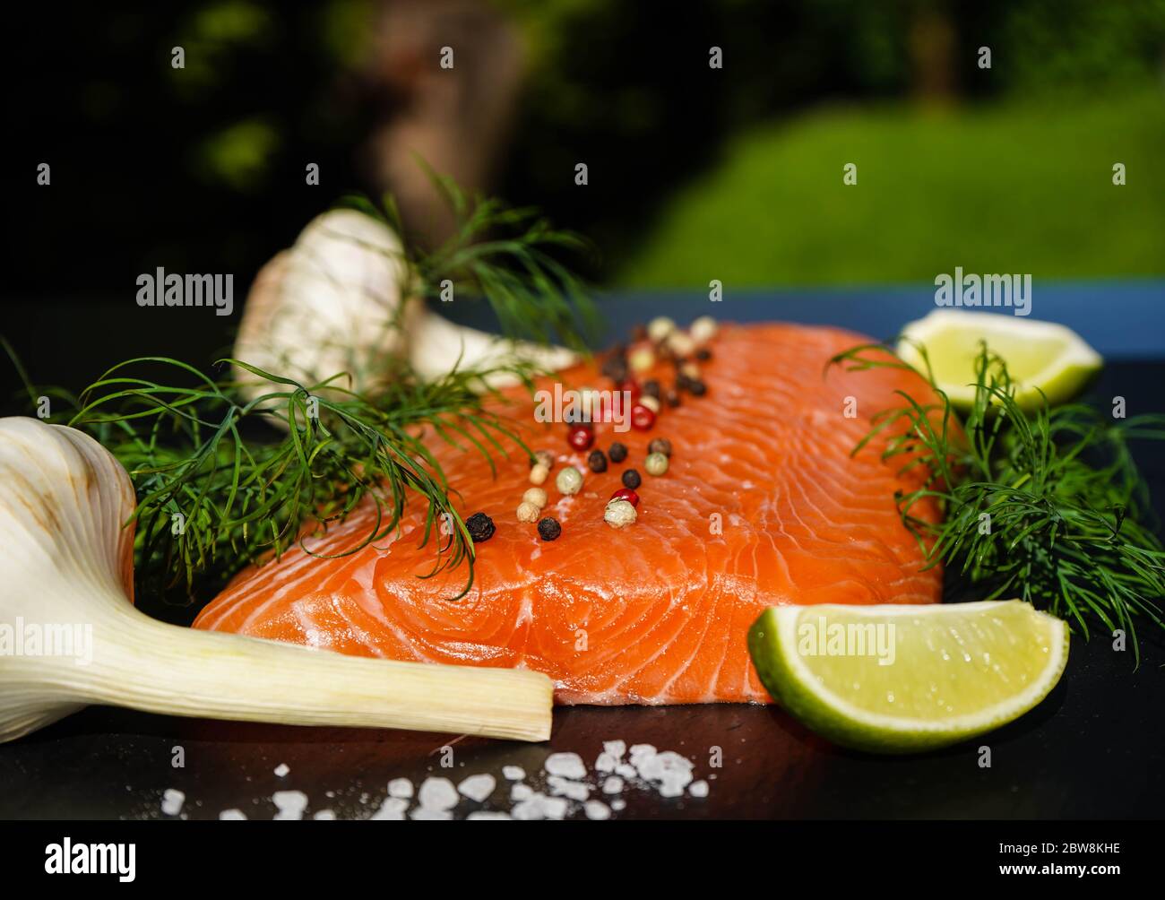 Fresh Salmon Steak with herbs and spices Stock Photo - Alamy