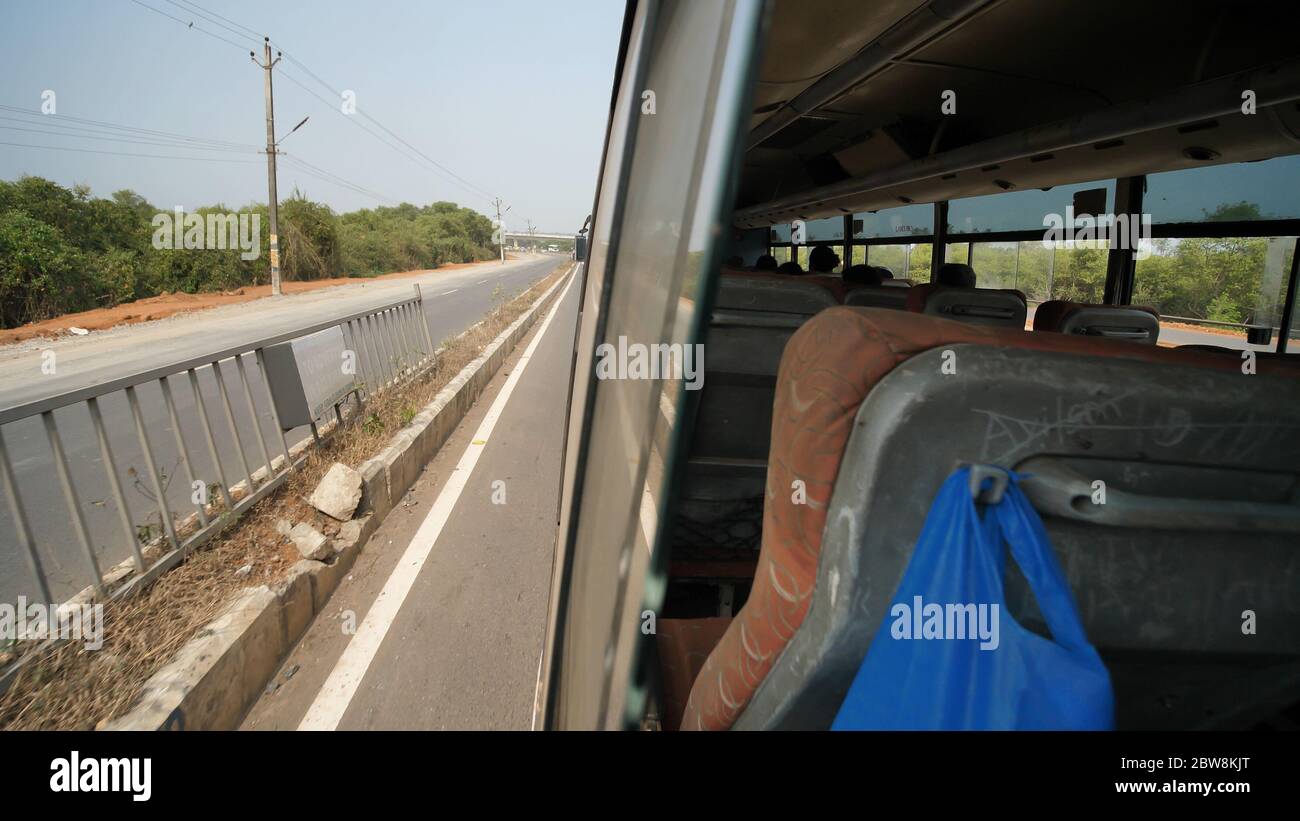 The view from the window of an intercity bus in India. State of Goa ...