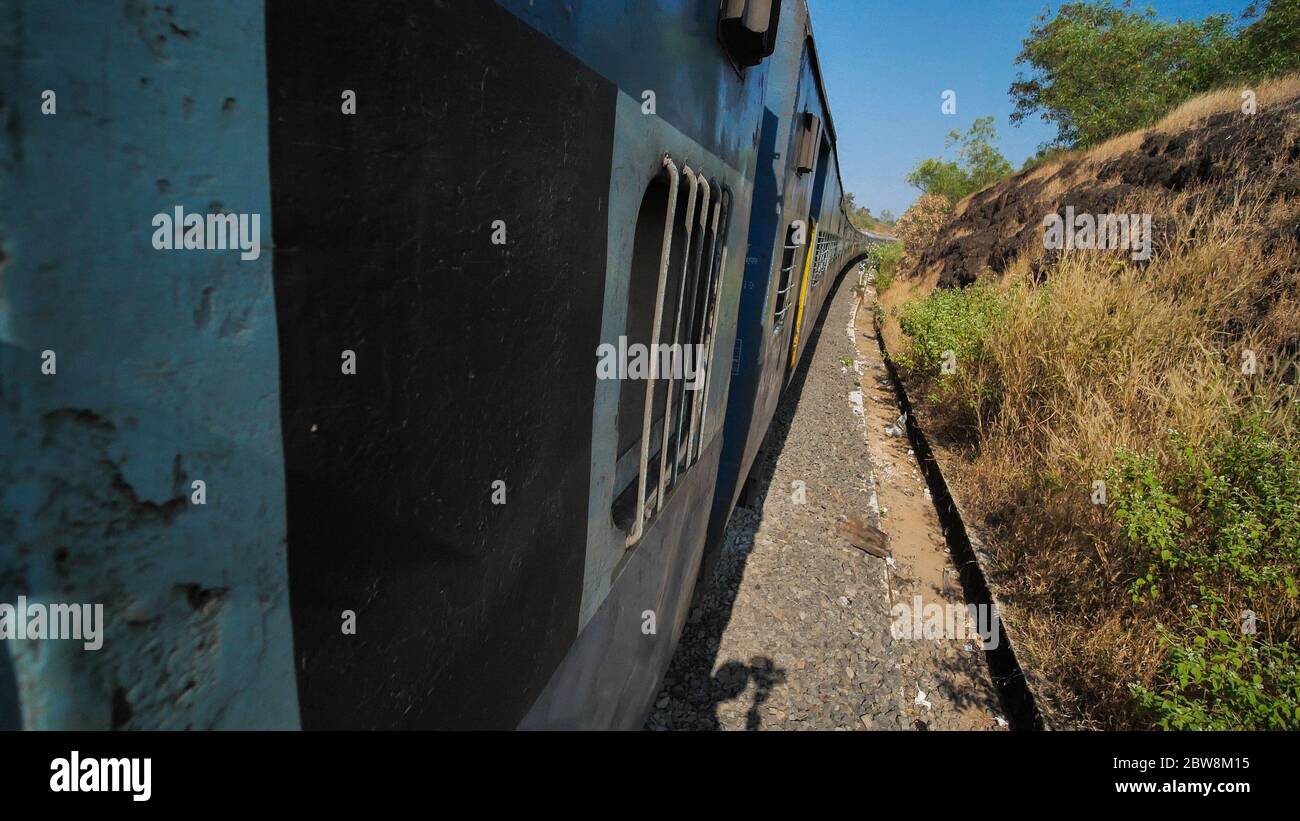 View from the vestibule on the tail of an Indian train Stock Photo - Alamy