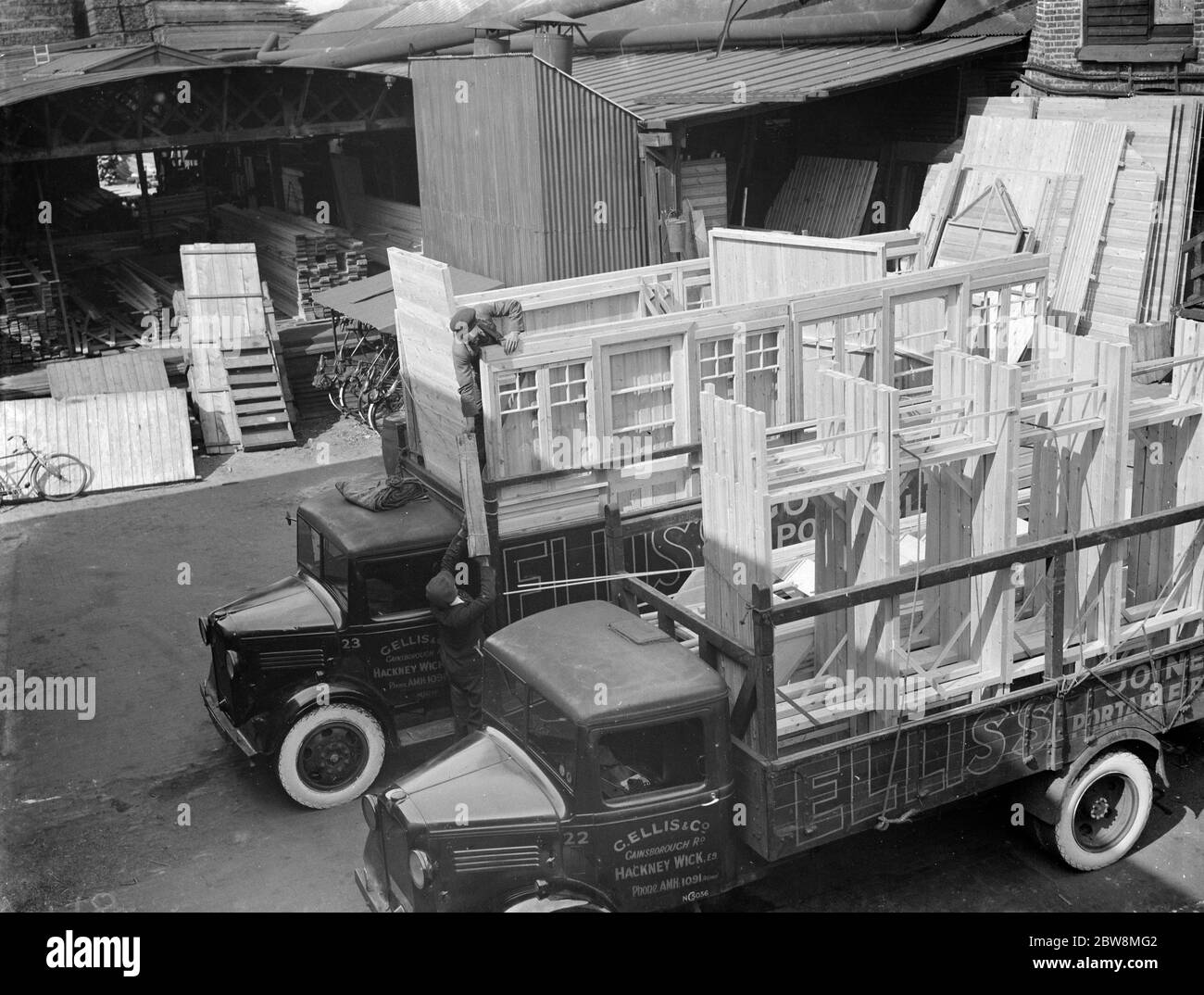 Loading Bedford lorrys at the G Ellis joinery works in Hackney . 7 ...