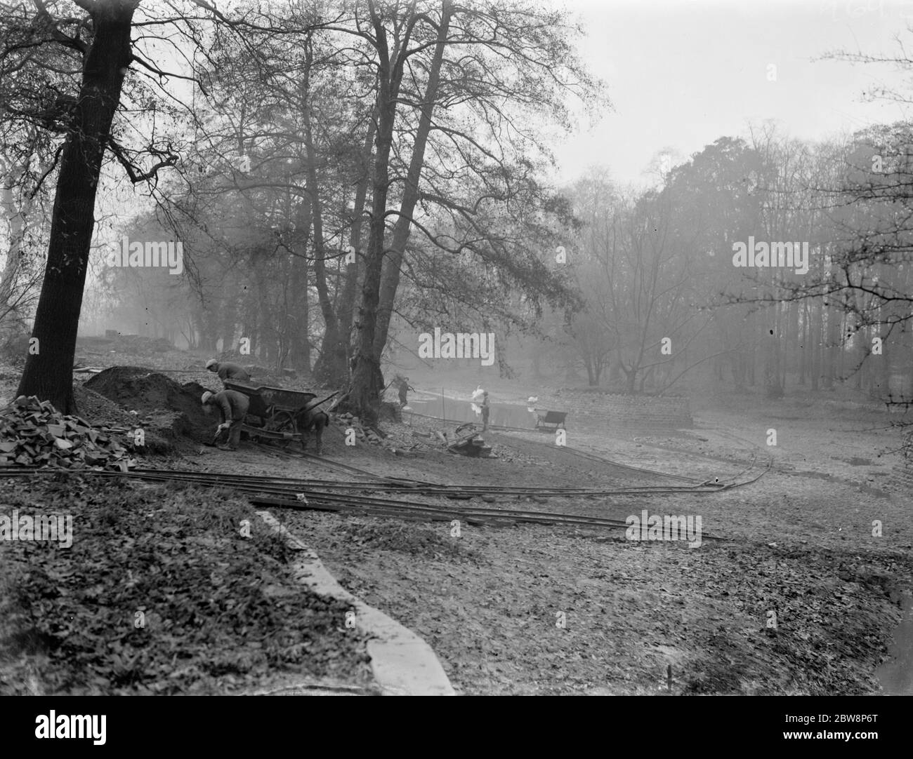Workmen reconstructing the old Mottingham gardens , Bromley . 1937 ...