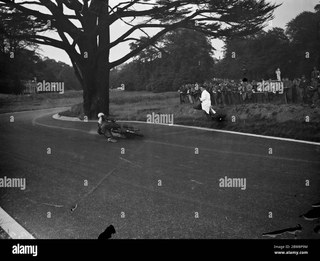 Crystal Palace road racing . A R Foster ' s bike skids out from under ...