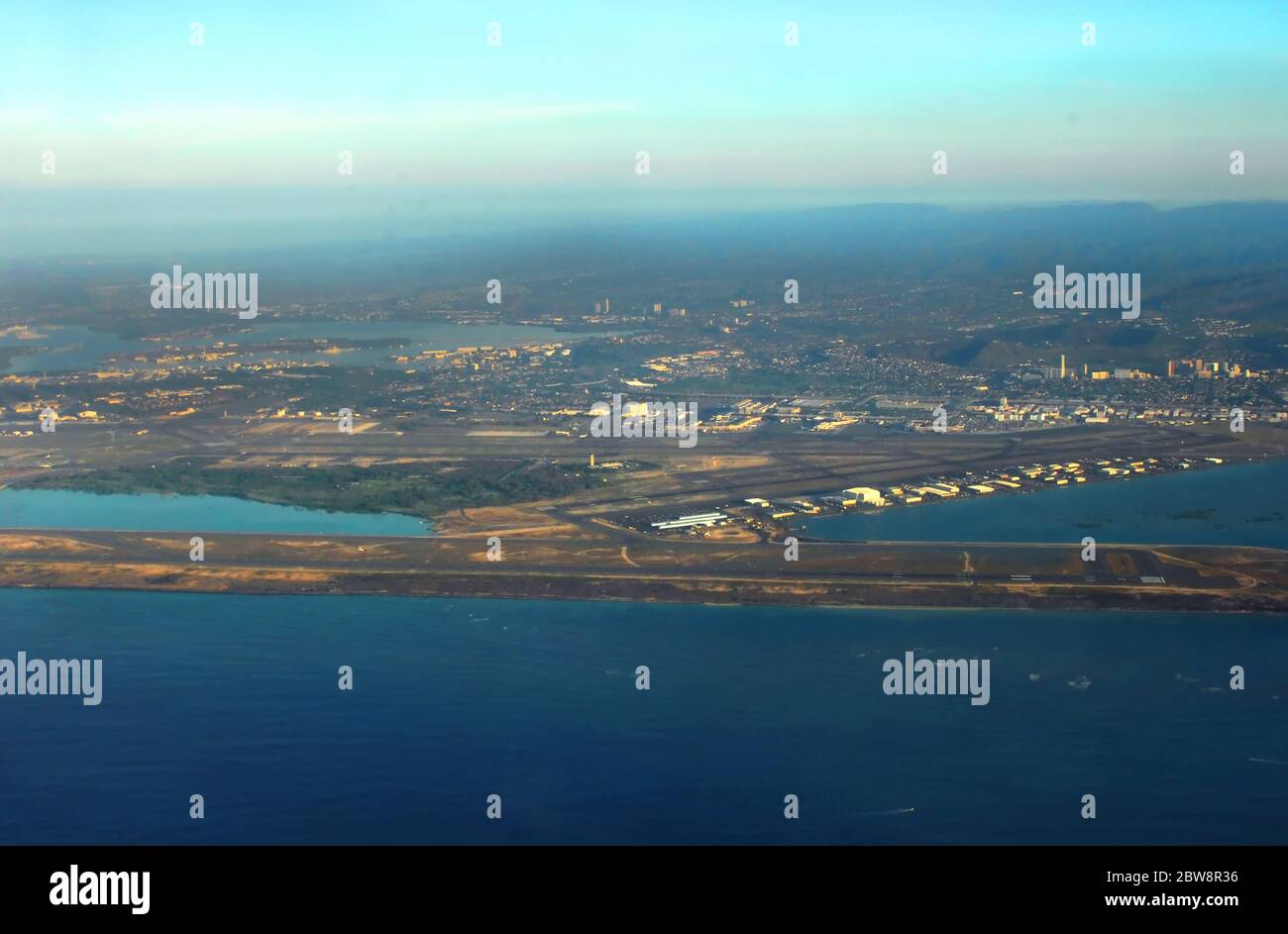 Morning breaks over Mamala Bay and the Honolulu International Airport ...