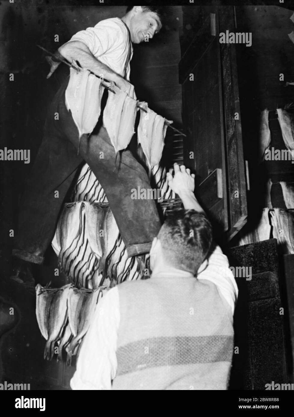 Curing fish in a limehouse in Stepney . 1936 Stock Photo - Alamy