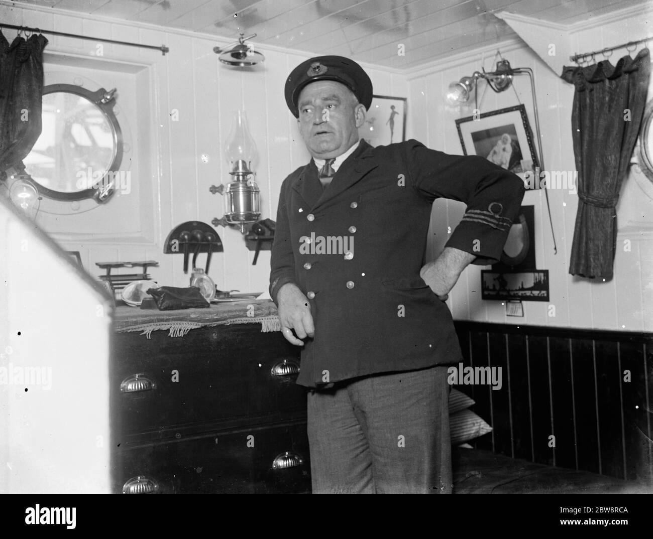 The Captain of the tramp steamer , ' Eston ' in his cabin . 1935 Stock ...