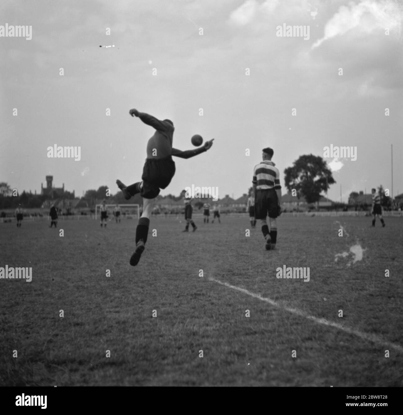 Dartford Football Club in action . The goalkeeper clears the ball ...