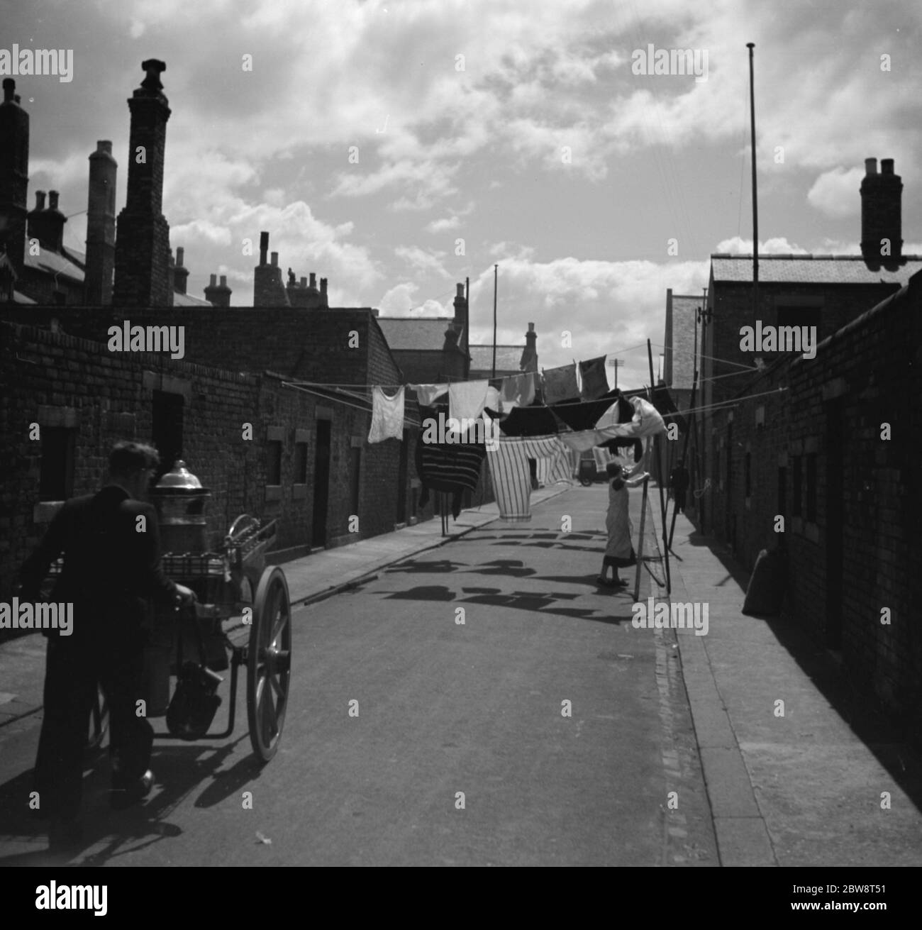Women hand washing clothes Black and White Stock Photos & Images - Alamy