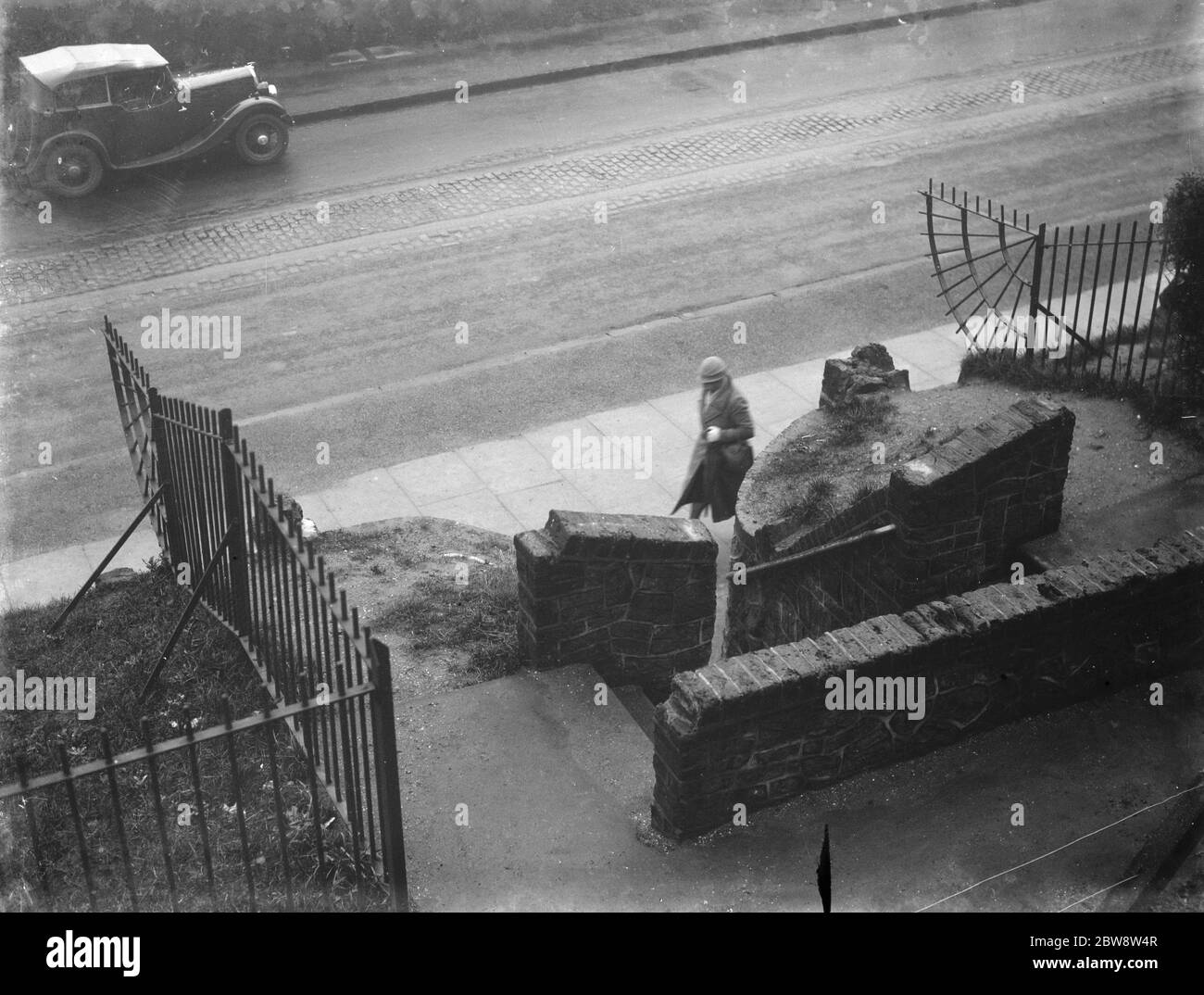 A dangerous footway in Crayford , Kent . 1936 Stock Photo - Alamy