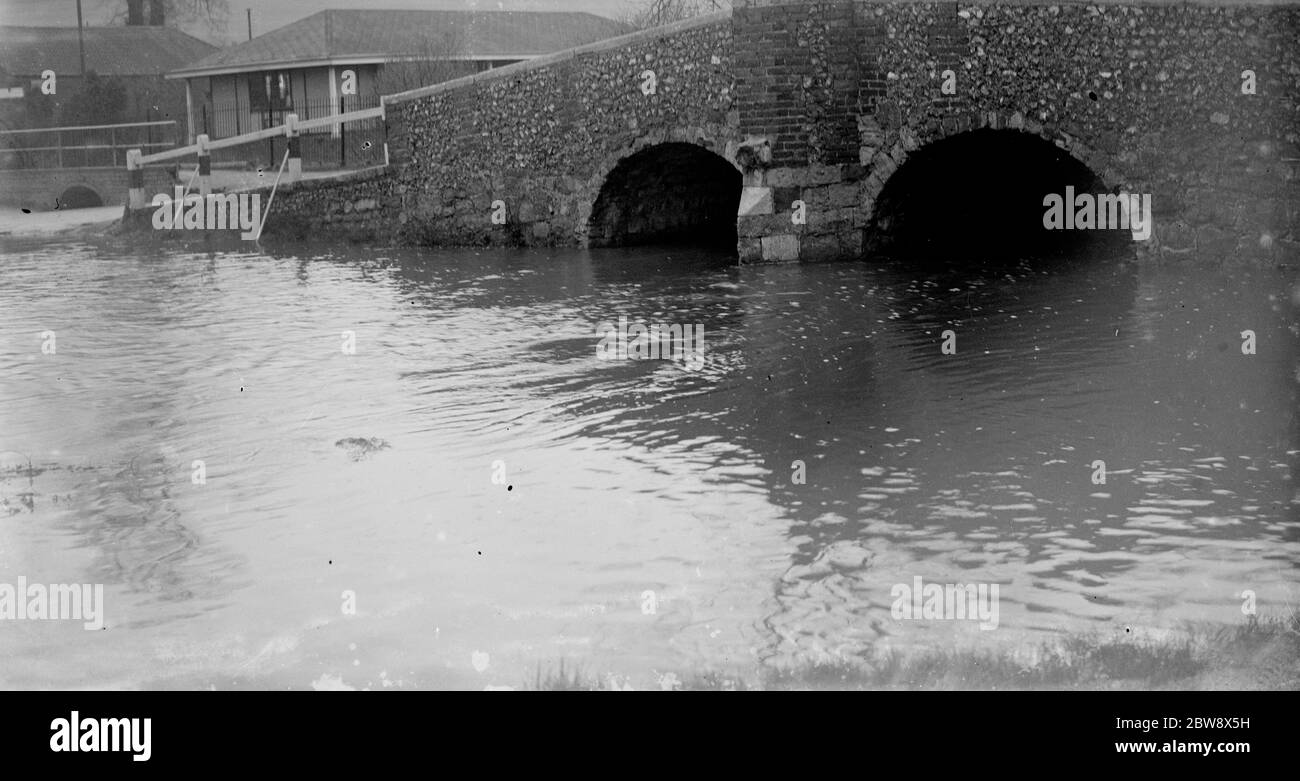 High water at the bridge crossing the River Darent at Shoreham , Kent ...