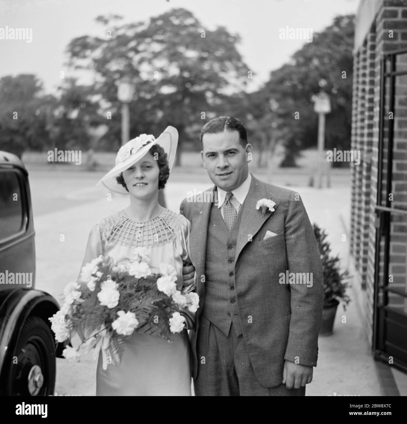 The wedding of Richards and Driscoll . Two of the guests . 1936 Stock ...