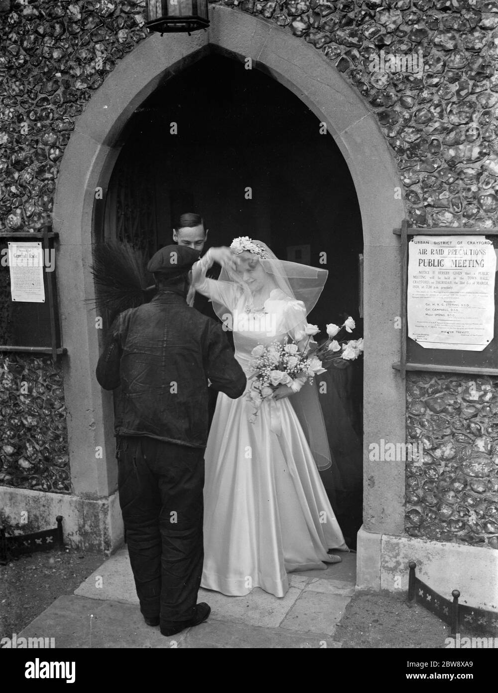 Jones E and Miss Easton , bride and bridegroom with sweep . 1938 Stock ...