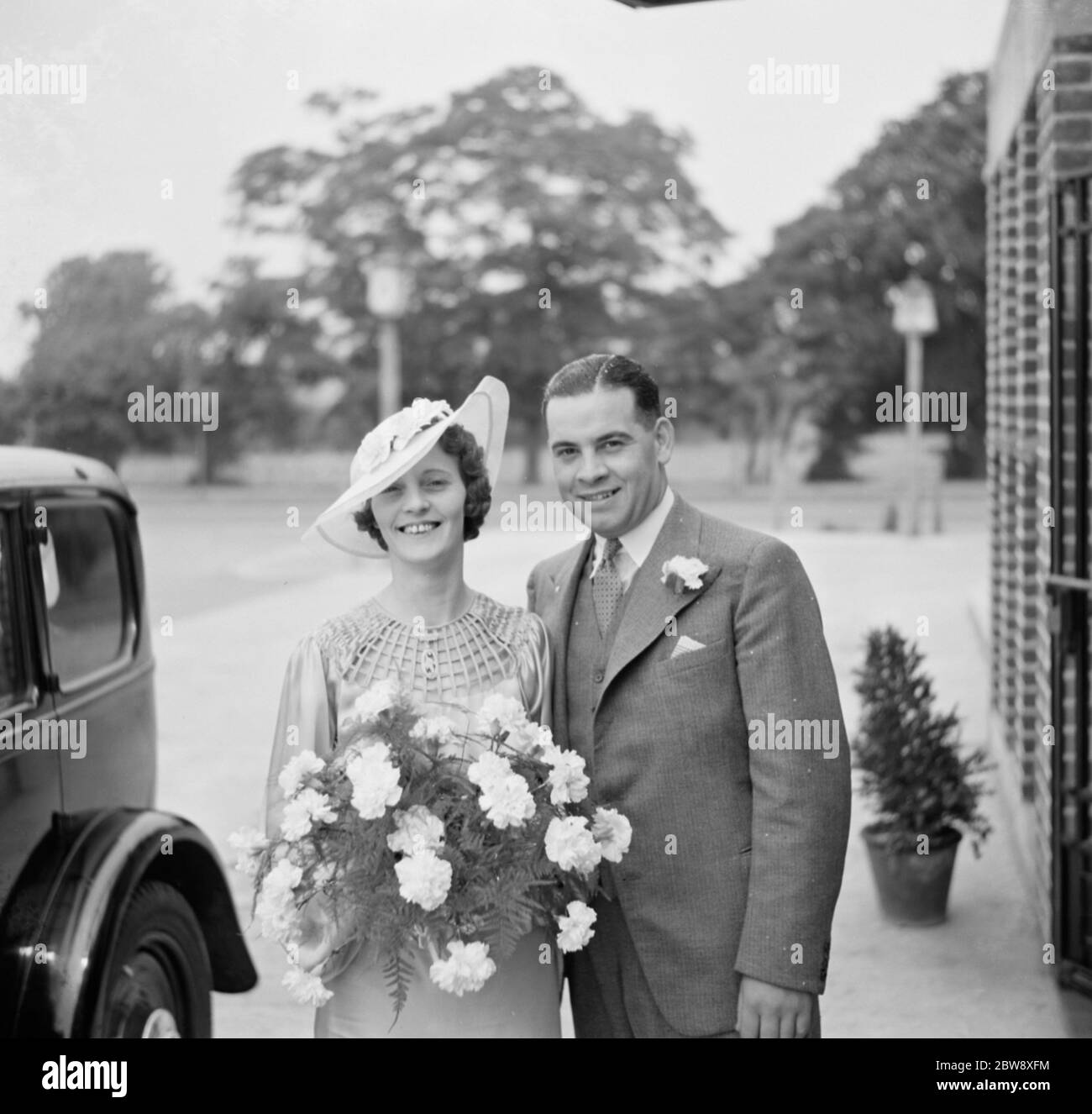 The wedding of Richards and Driscoll . Two of the guests . 1936 Stock ...